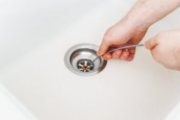 How to Unjam a Garbage Disposal | ApplianceTeacher